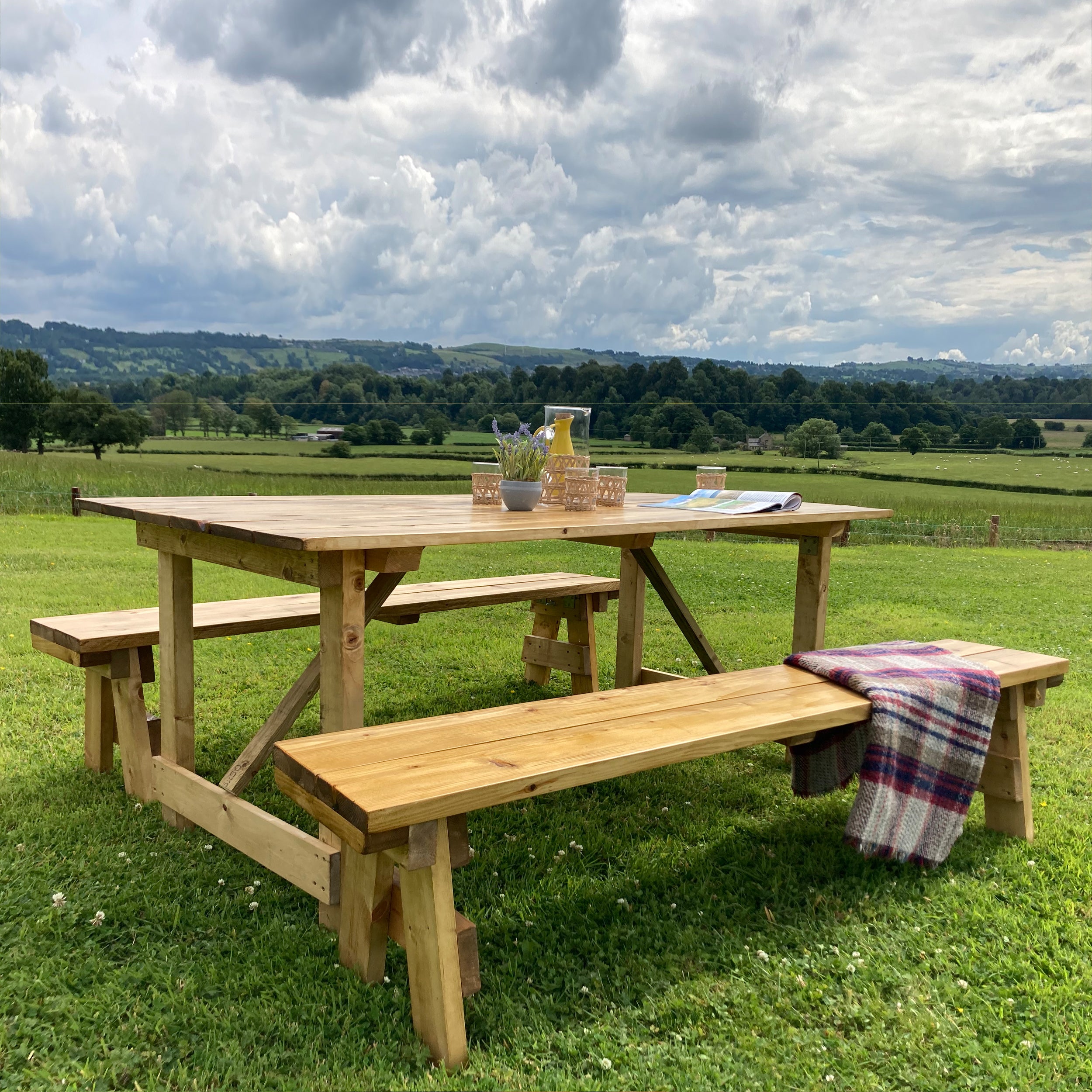 3. Indoor Folding Rustic-style Bench – The Trestle Table Company